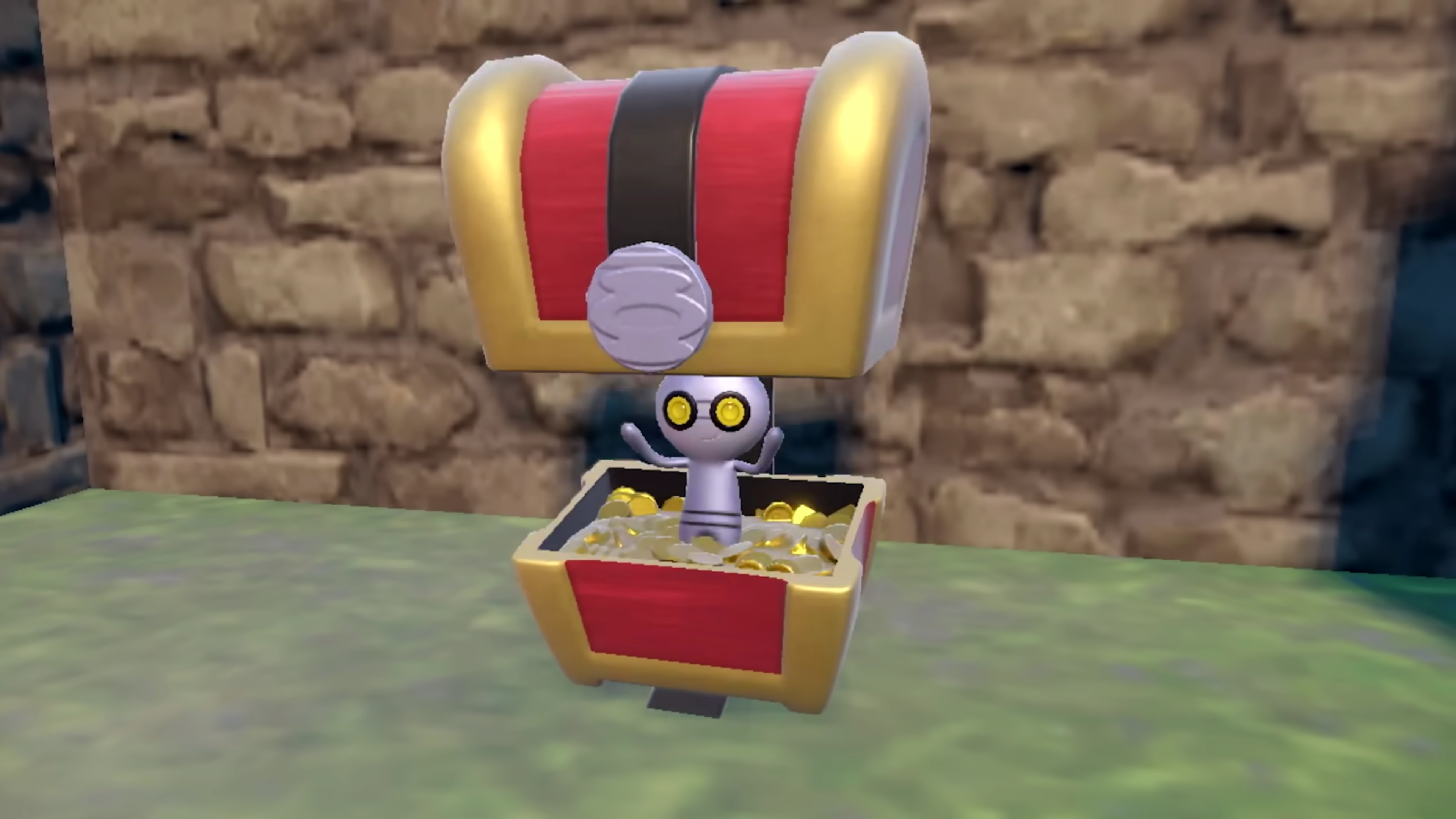 Gimmighoul is a new Ghost type Pokémon coming to Pokémon Scarlet and ...