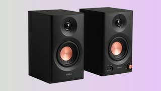 Edifier MR3 speakers on a gradient background